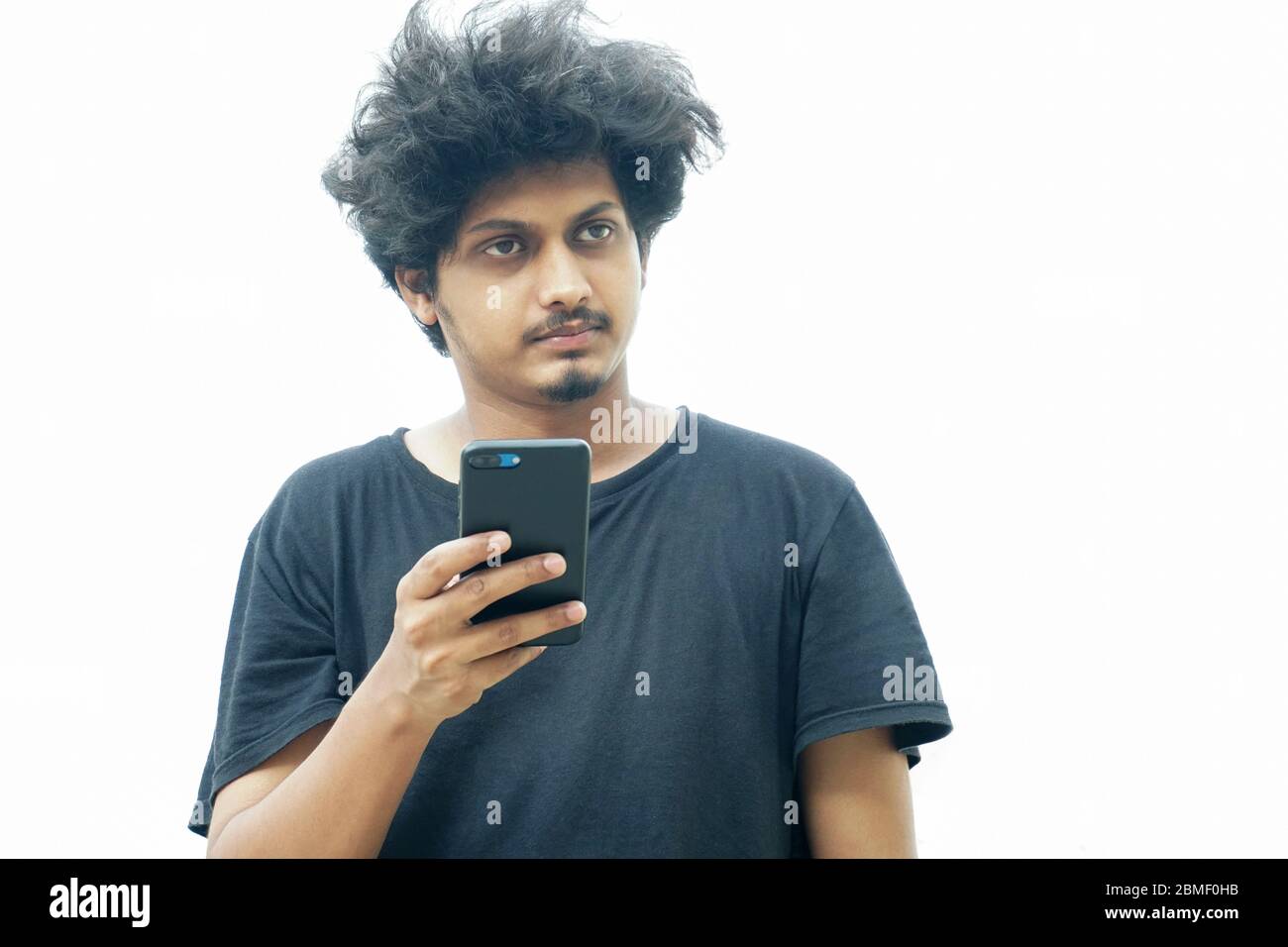 Indian man afro hairstyle hi-res stock photography and images - Alamy