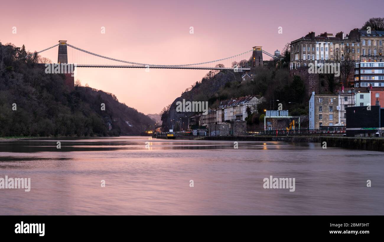 Bristol, England, UK - March 8, 2020: Sunset casts a pink glow over the ...