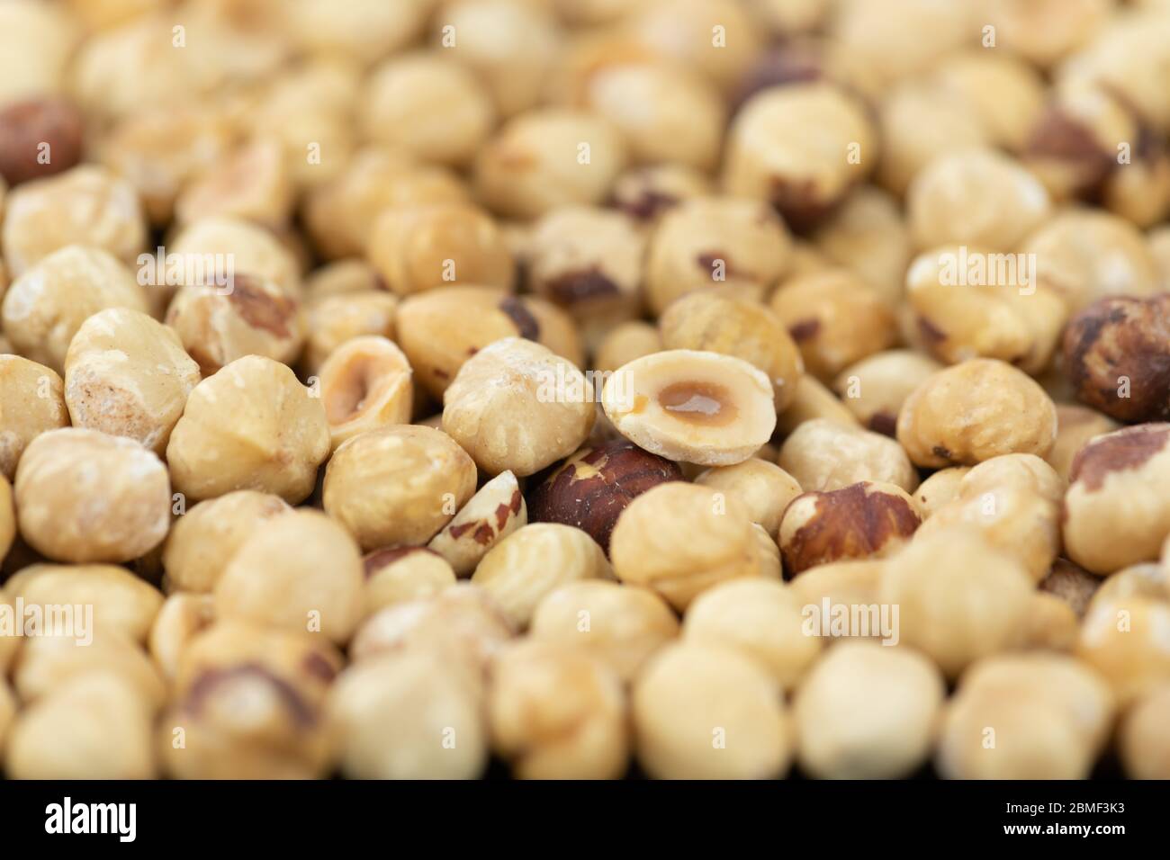 Peeled Hazelnuts for use as background or texture (close up shot Stock ...