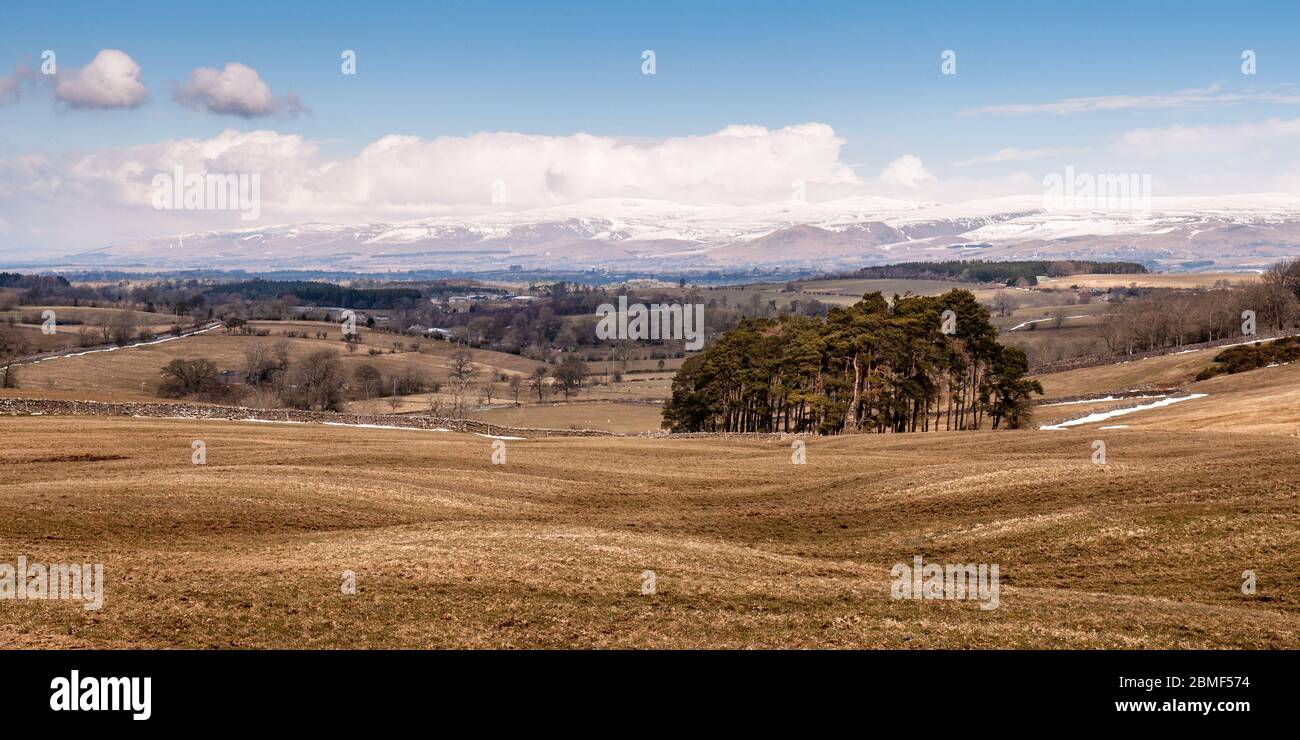 Sun shines on the rolling farmland landscape of the Eden Valley, under ...