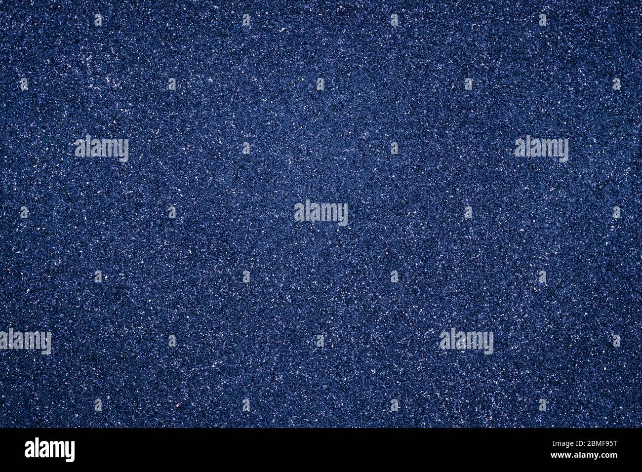 Abstract grain background, dark blue granular texture. Grunge wall ...