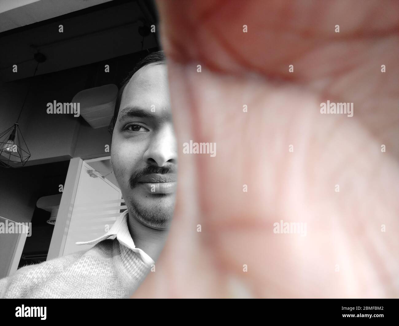 Man hiding face from camera hi-res stock photography and images - Alamy