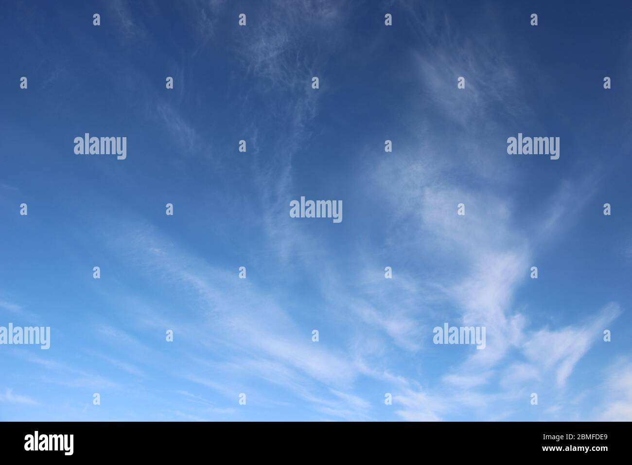 Blue sky with white light easy clouds Stock Photo - Alamy