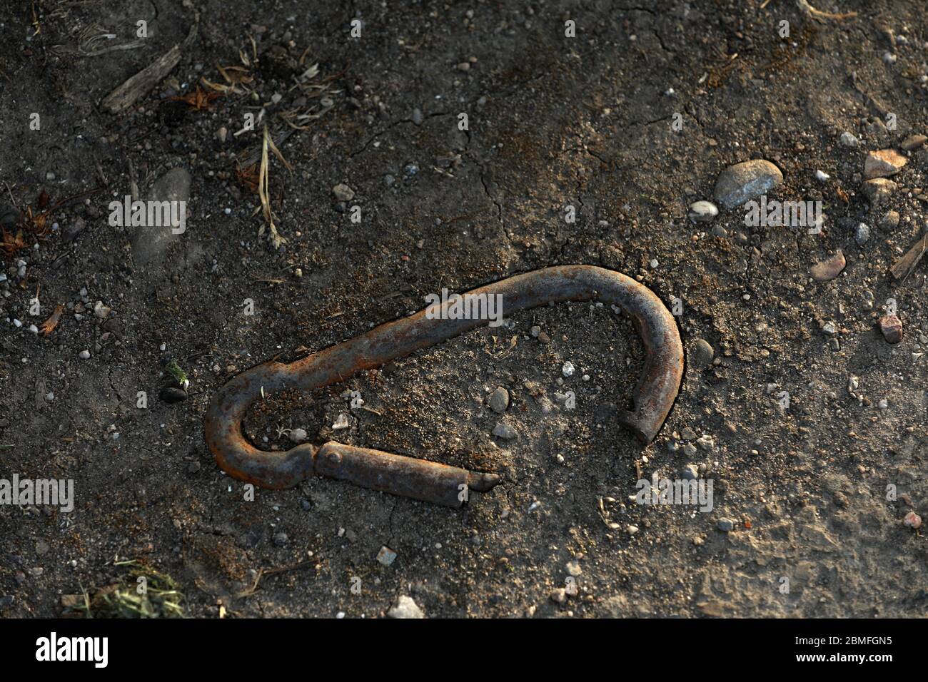 Carabiner Snap hook broken on the floor Stock Photo - Alamy