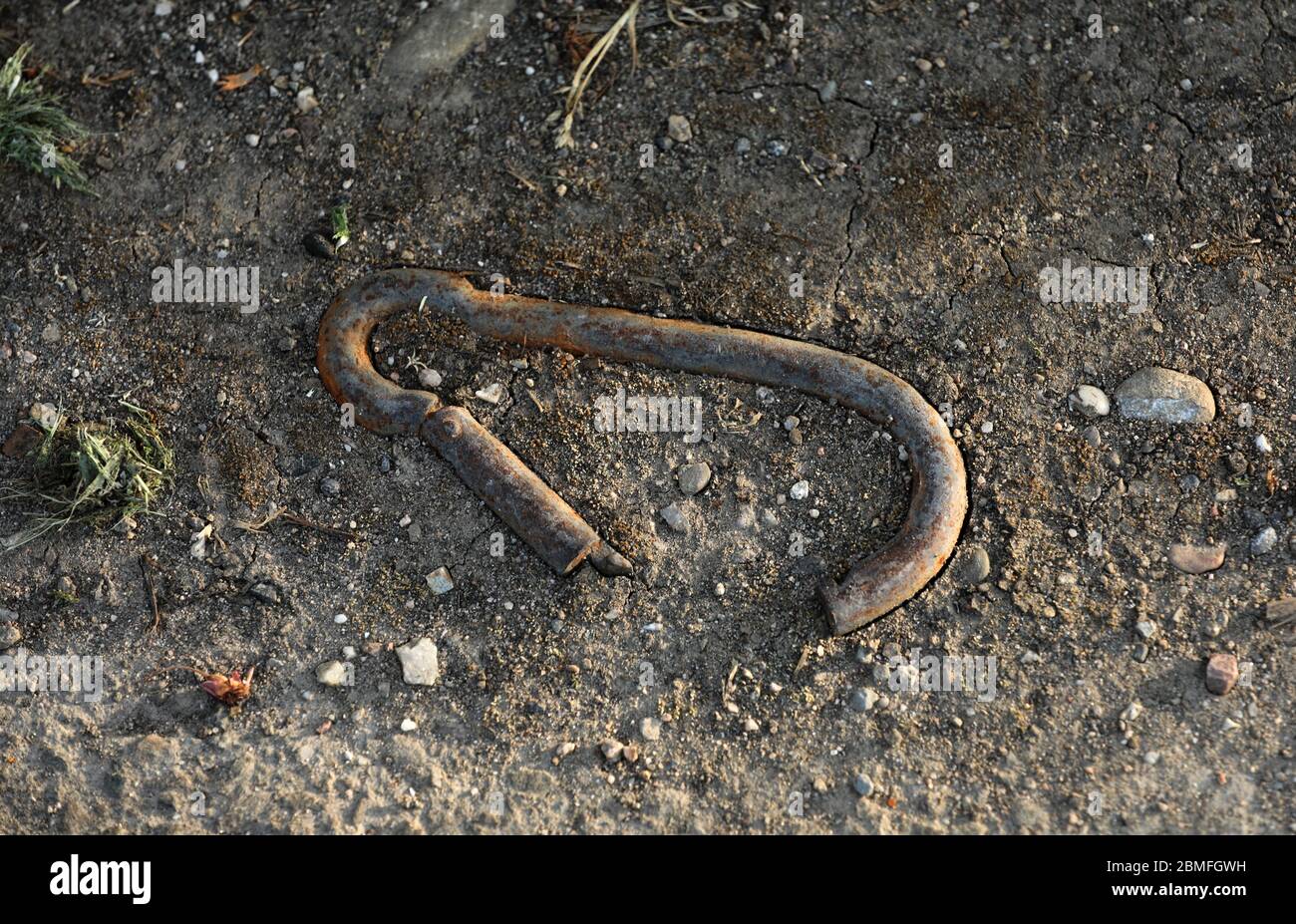 Carabiner Snap hook broken on the floor Stock Photo - Alamy