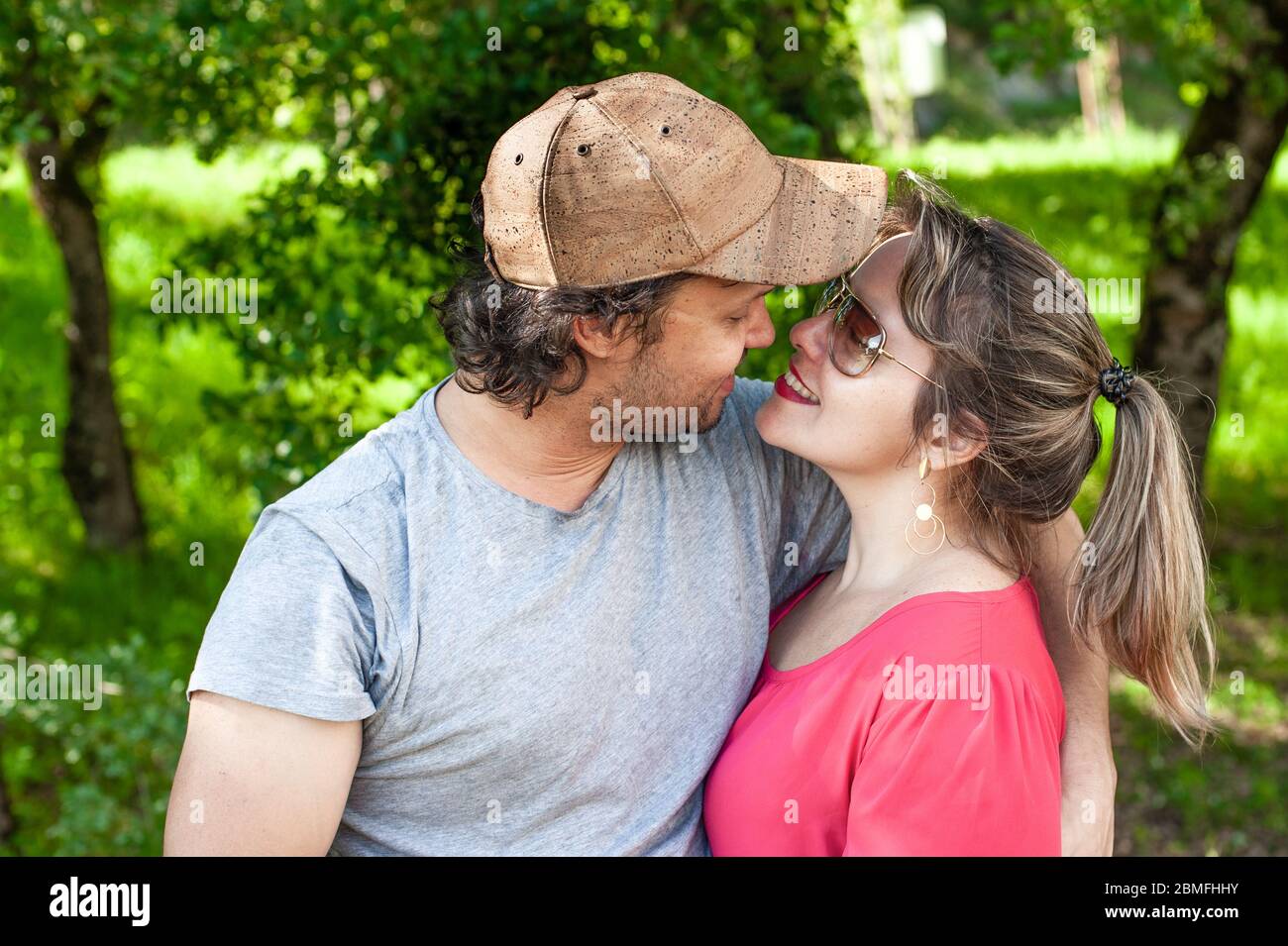 Lovely couple staring to each other in a romantic scene Stock Photo - Alamy