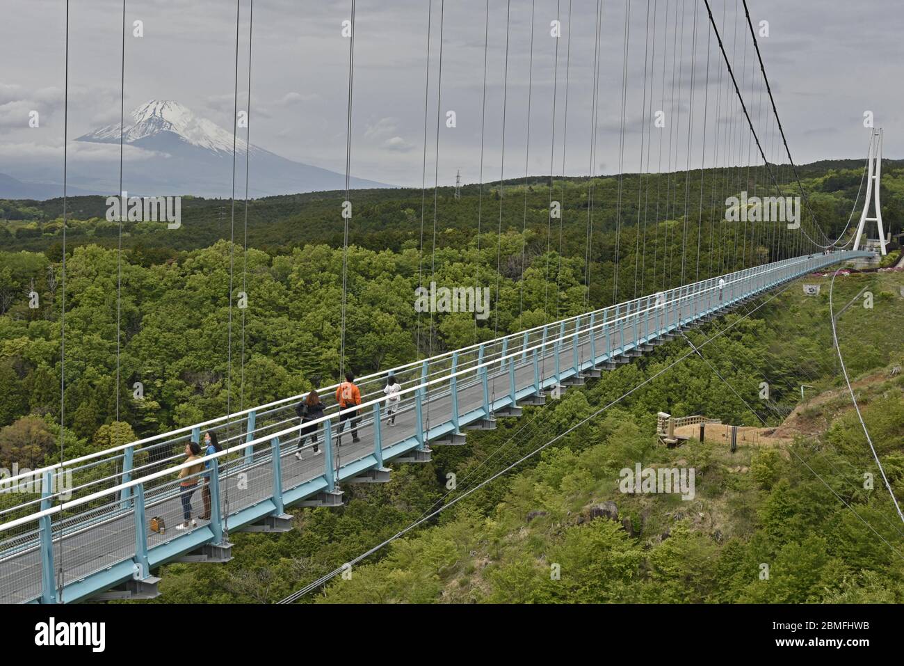 People view Mt. Fuji on May 9, 2020, from the Mishima Sky Walk ...