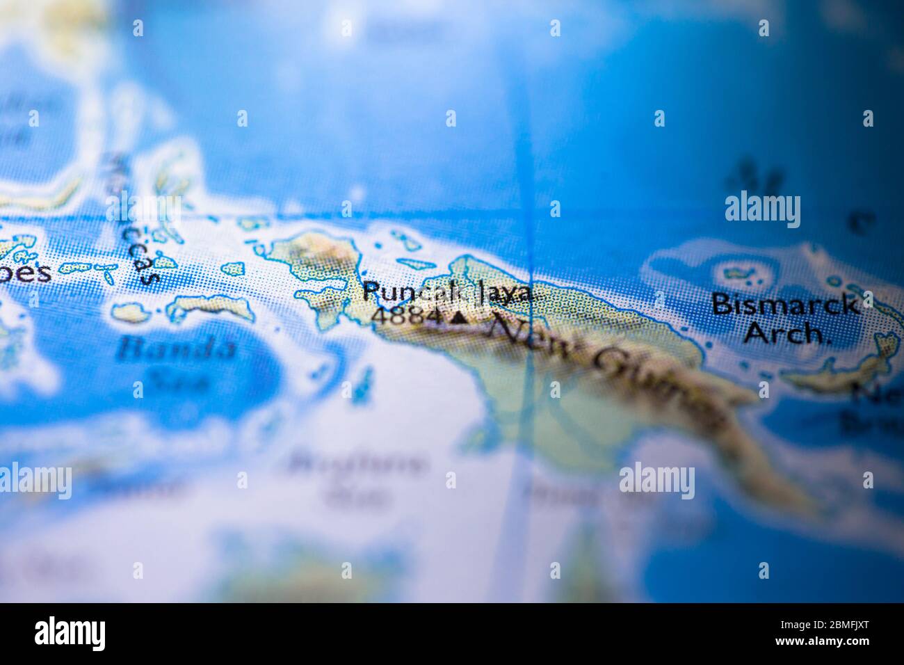Shallow depth of field focus on geographical map location of Puncak ...