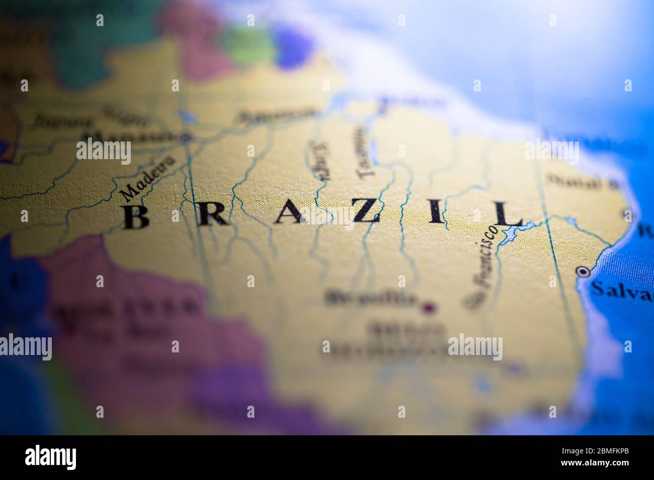 Shallow depth of field focus on geographical map location of country ...