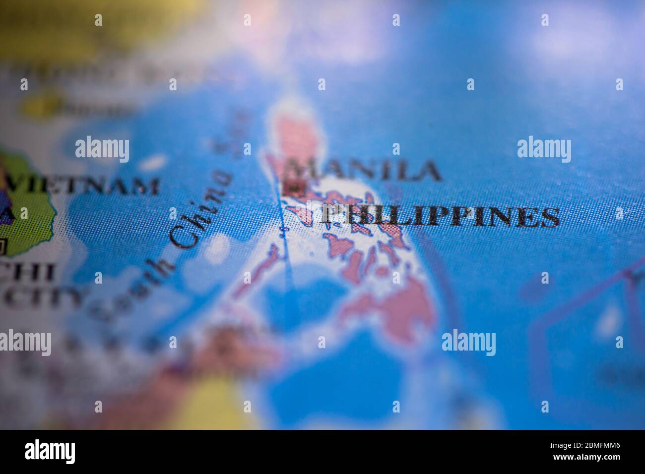 Shallow depth of field focus on geographical map location of country ...