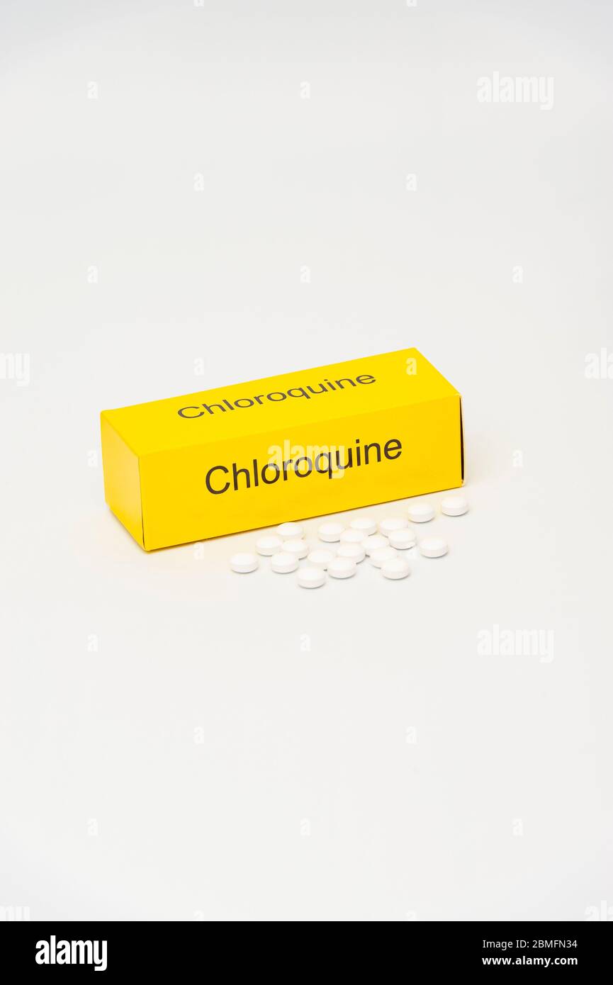 Chloroquine packaging with scattered tablets. Isolated on white ...