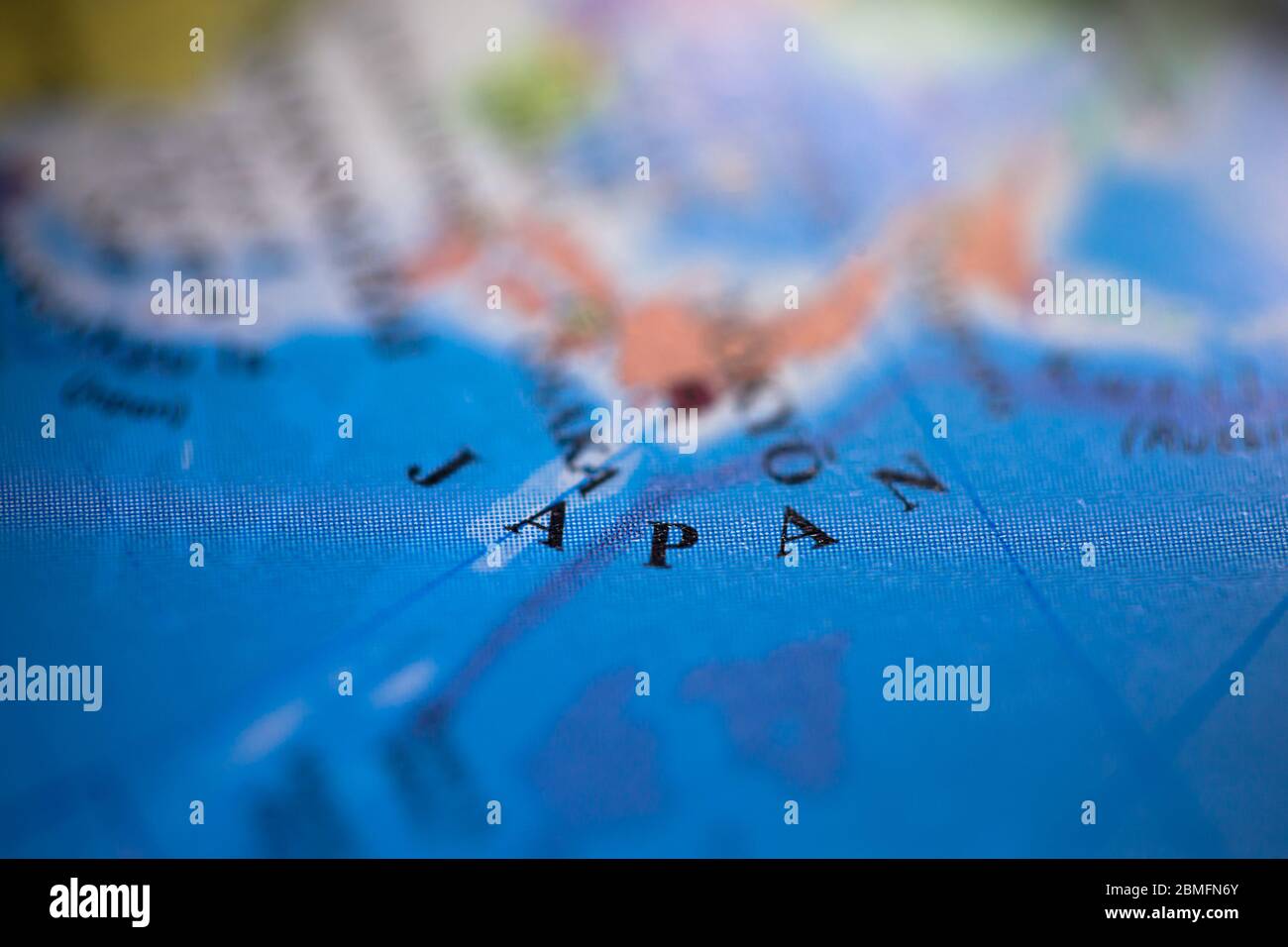 Shallow depth of field focus on geographical map location of country ...