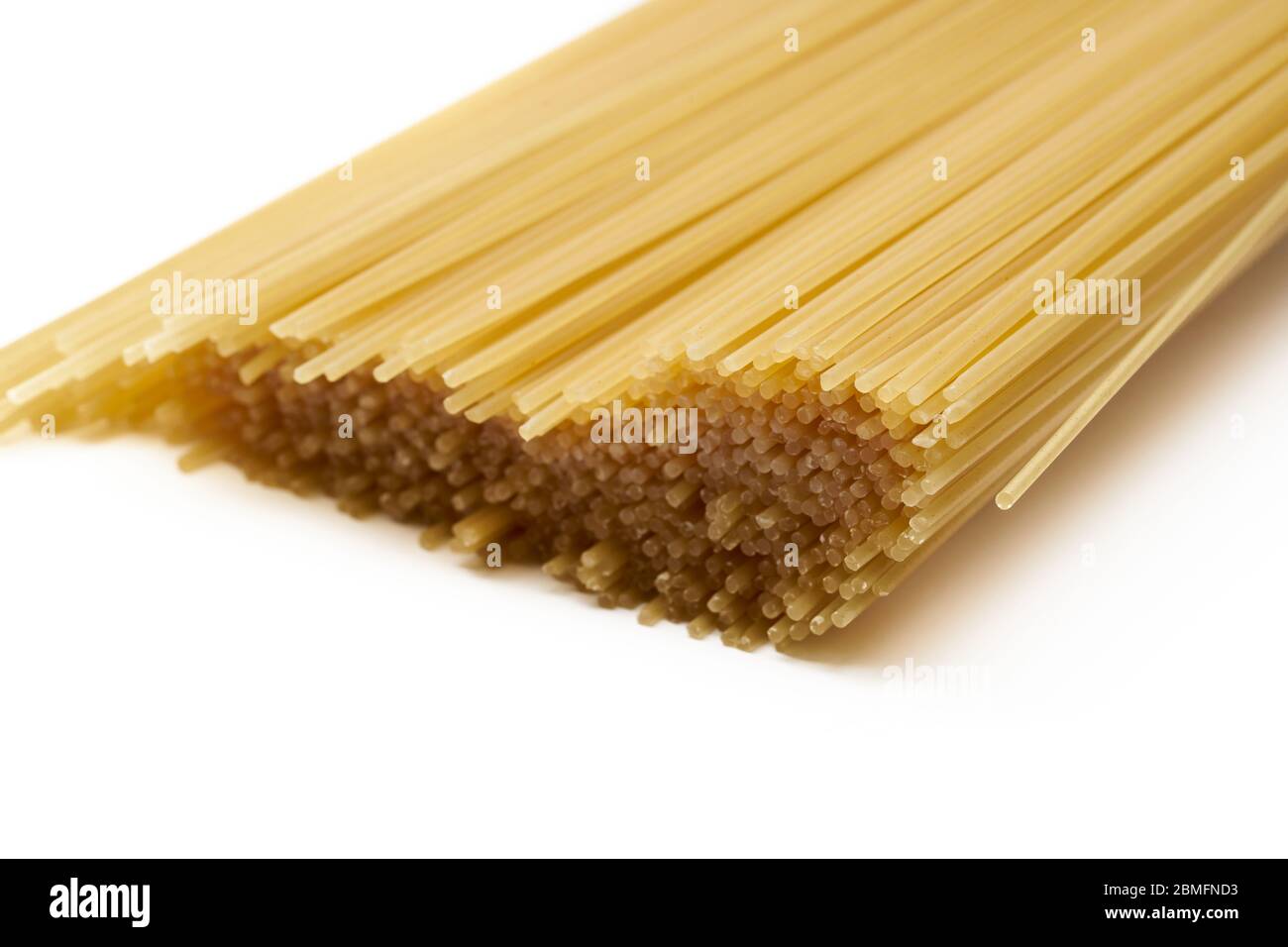 Raw italian pasta isolated on white background Stock Photo - Alamy