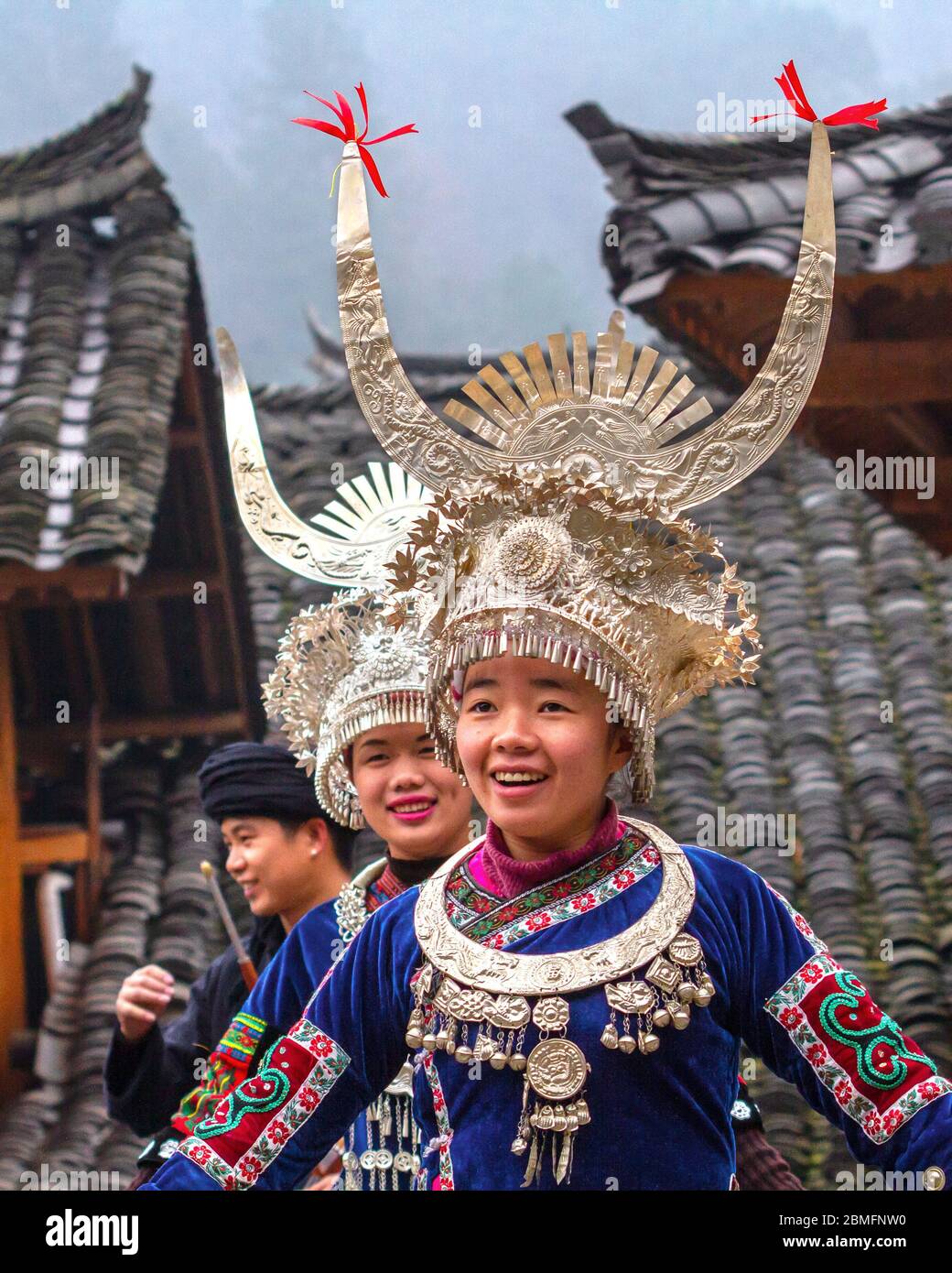 Young girls performing a traditional dance.They are of the Longde long ...