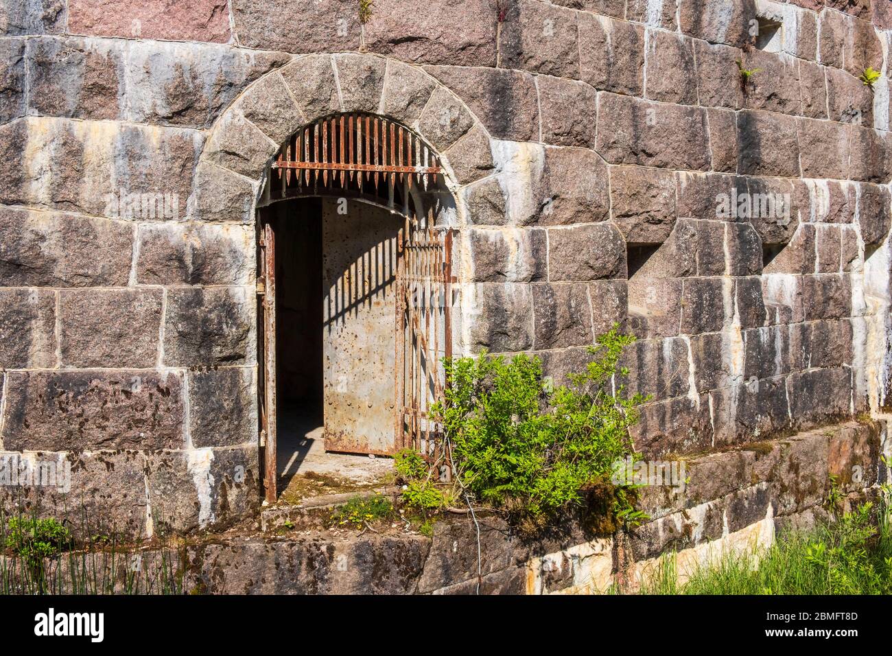 Iron gate in a fortified wall Stock Photo - Alamy