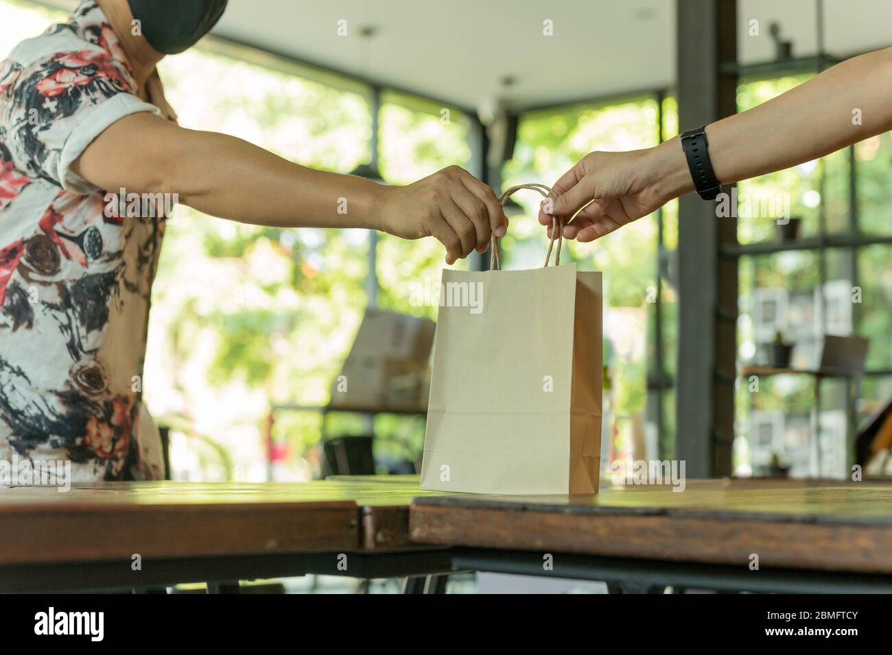 Waitress serving takeaway food to customer social distance conceptual ...