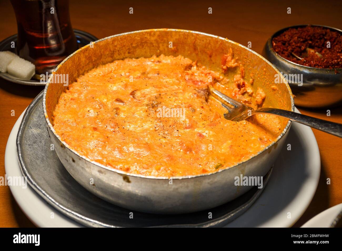 Traditional turkish food breakfast dish menemen made by eggs and ...