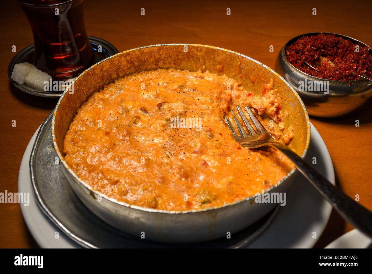 Traditional turkish food breakfast dish menemen made by eggs and ...