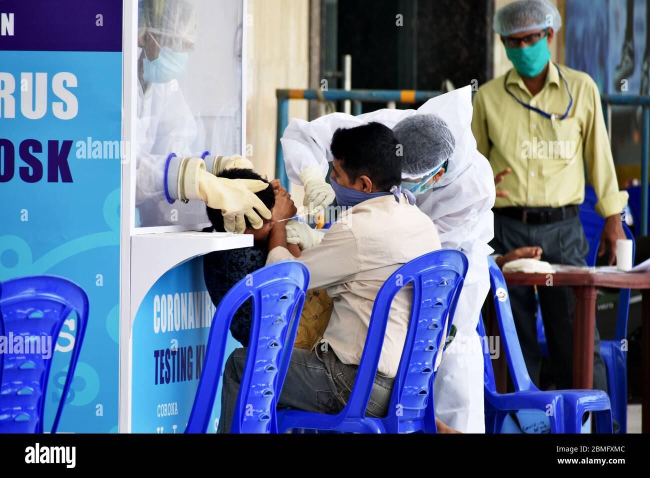 Howrah, India. 08th May, 2020. India: Swab sample is being collected ...