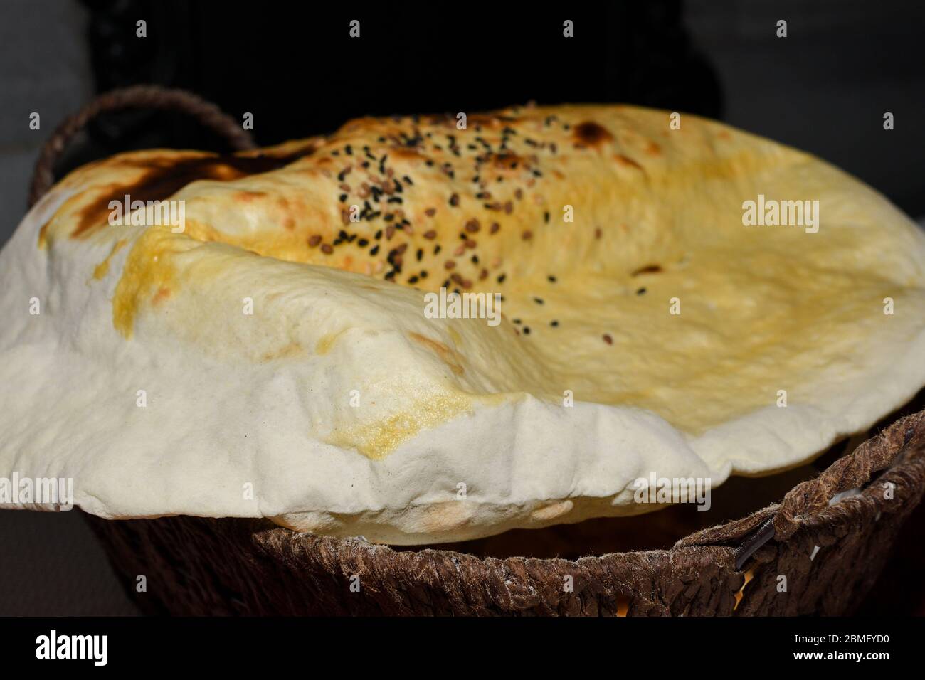 Lavash is a soft, thin unleavened flatbread made in a tandoor and eaten ...