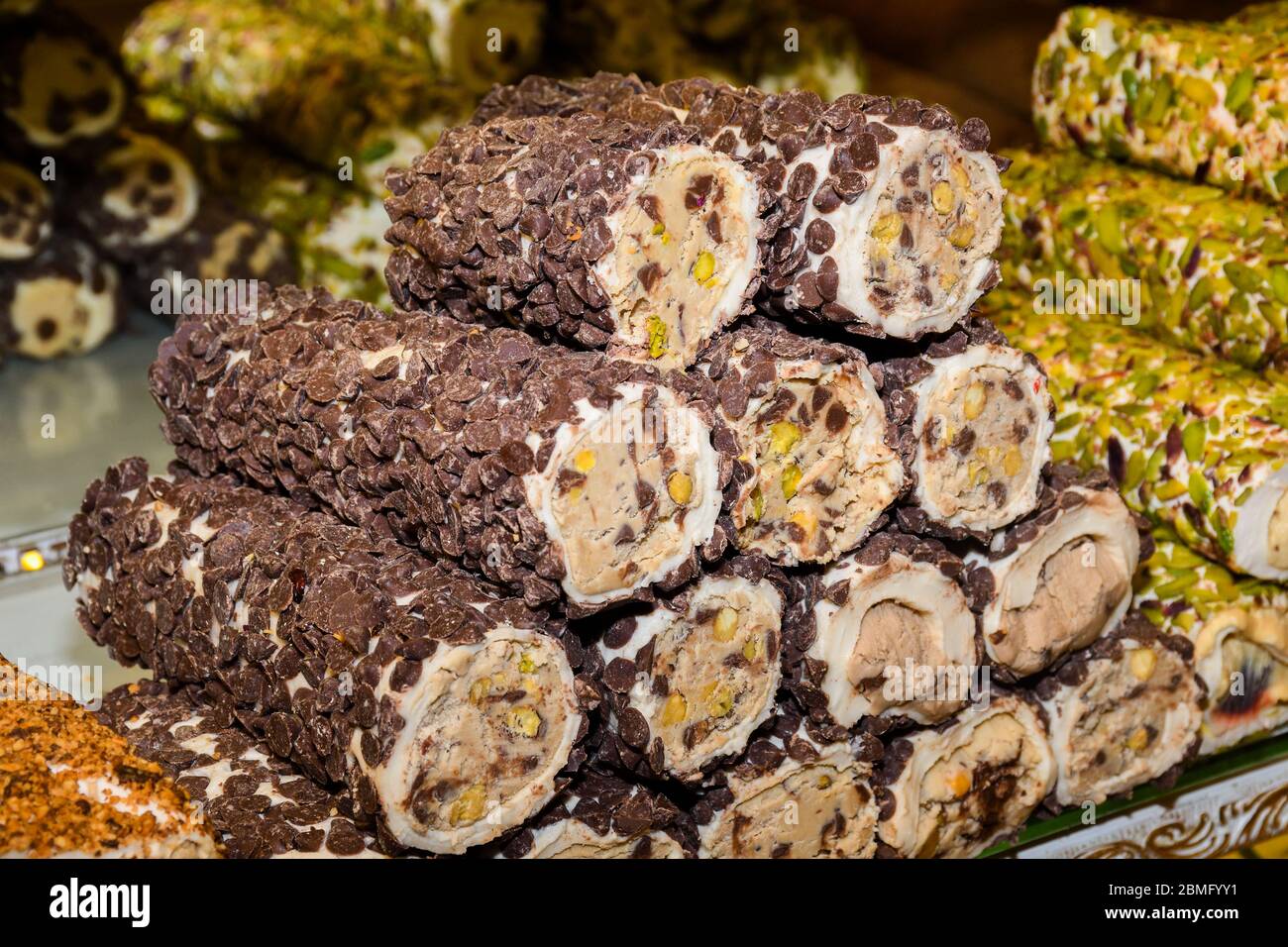 Traditional "lokum rolls" a sweet dessert turkish delights, pastry with ...