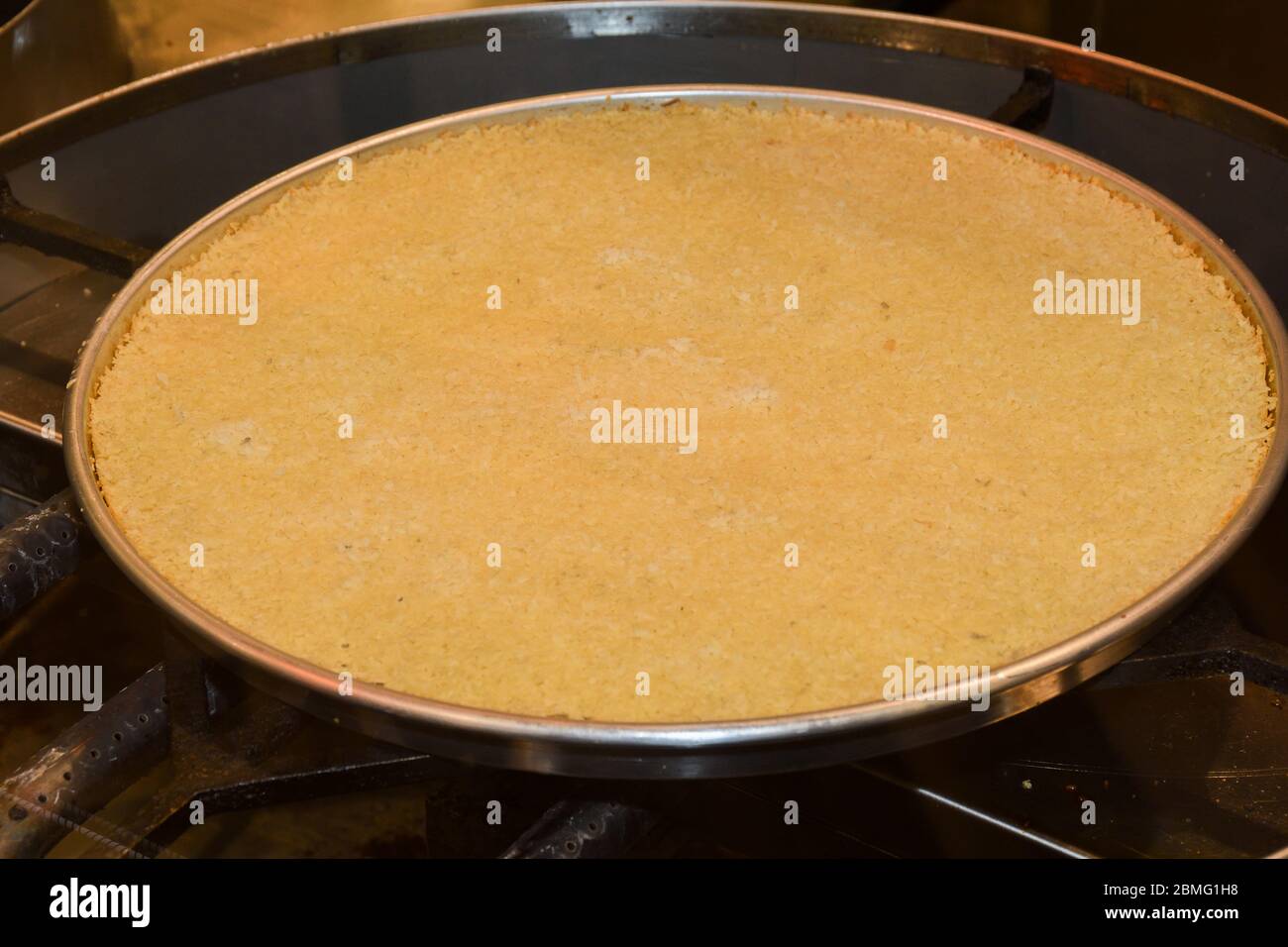 Turkish dessert kunefe with pistachio powder. Kunafa, kadayif with ...