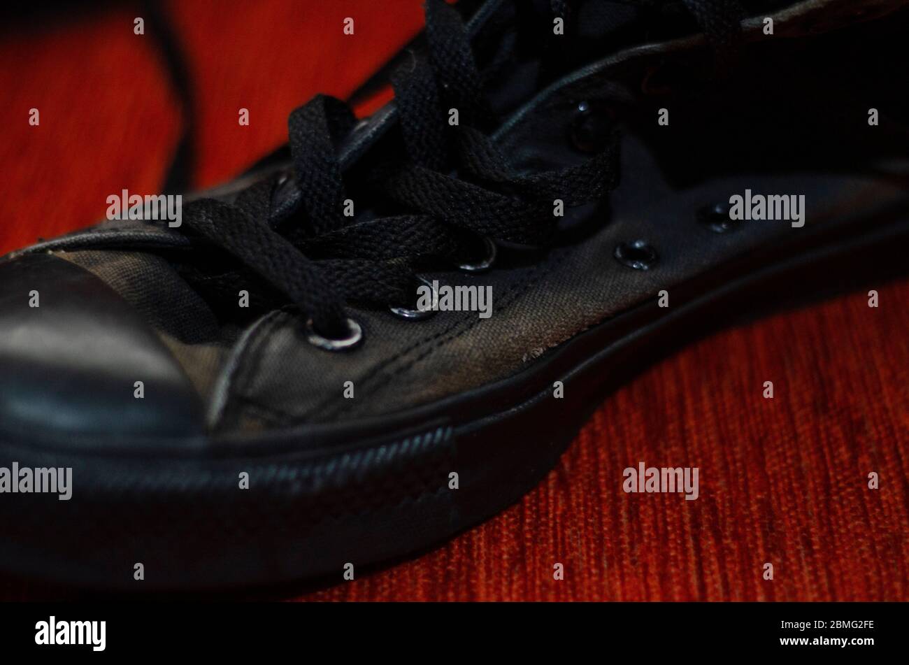 Black boot with red sole hi-res stock photography and images - Alamy