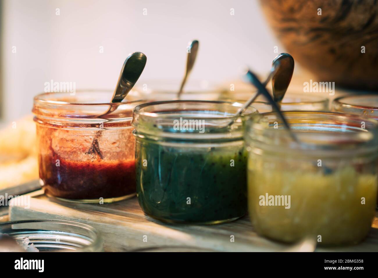 Homemade jars of variety fruits jam on the table Stock Photo - Alamy