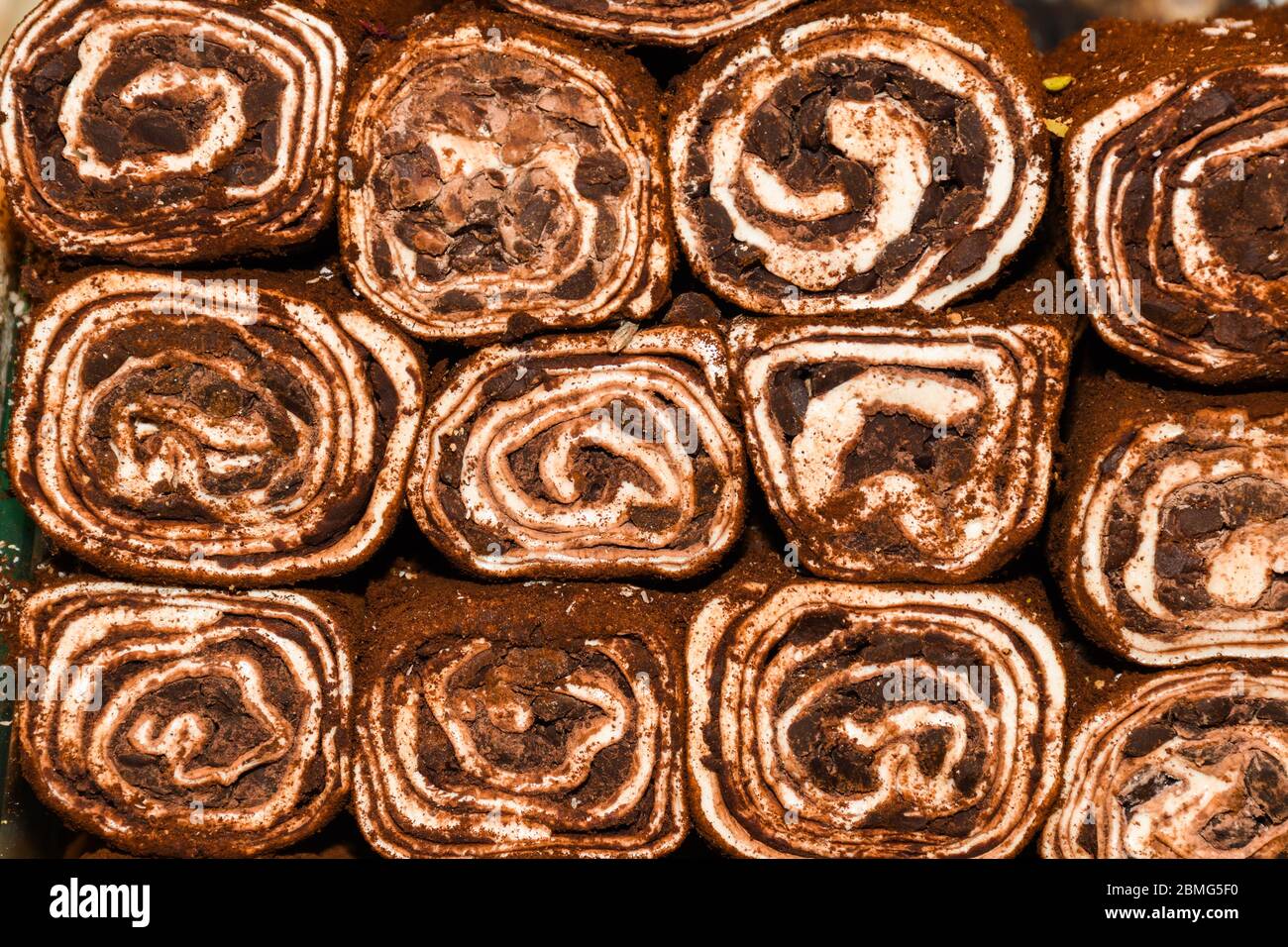 Traditional "lokum rolls" a sweet dessert turkish delights, pastry with ...