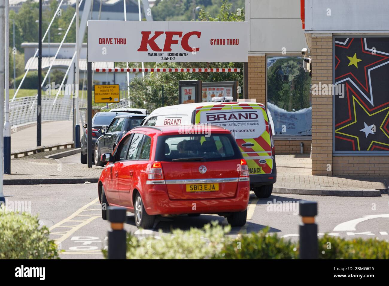 A queue of cars at the KFC restaurant Stock Photo - Alamy