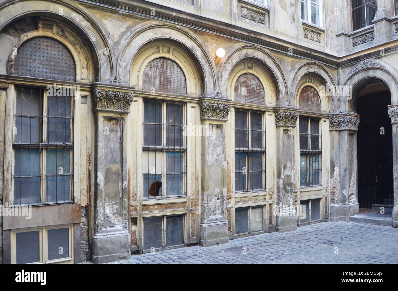 An old building at Budapest with the rustic wall and ancient arch Stock ...