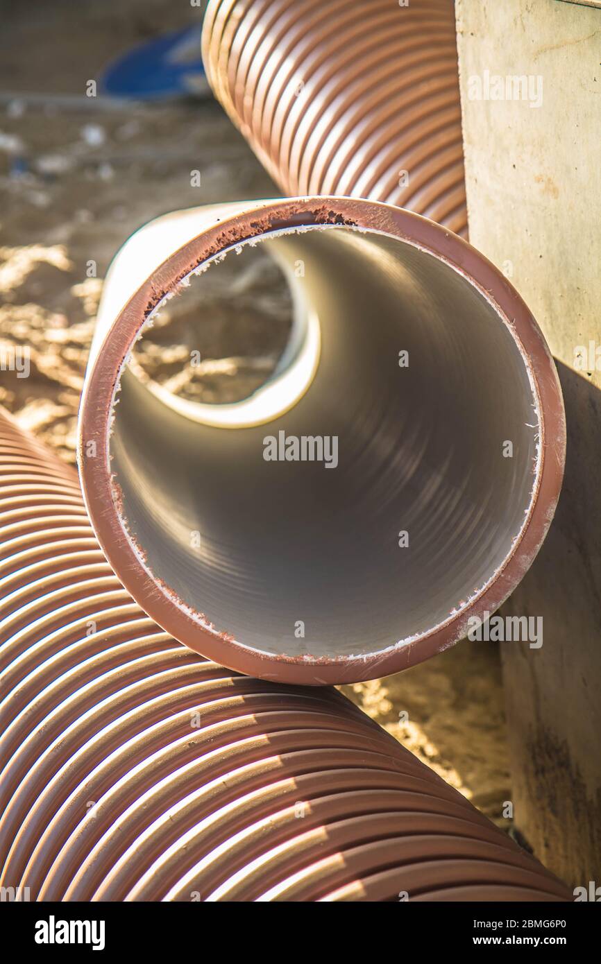 Underground pipes at at a construction site waiting to be used Stock ...