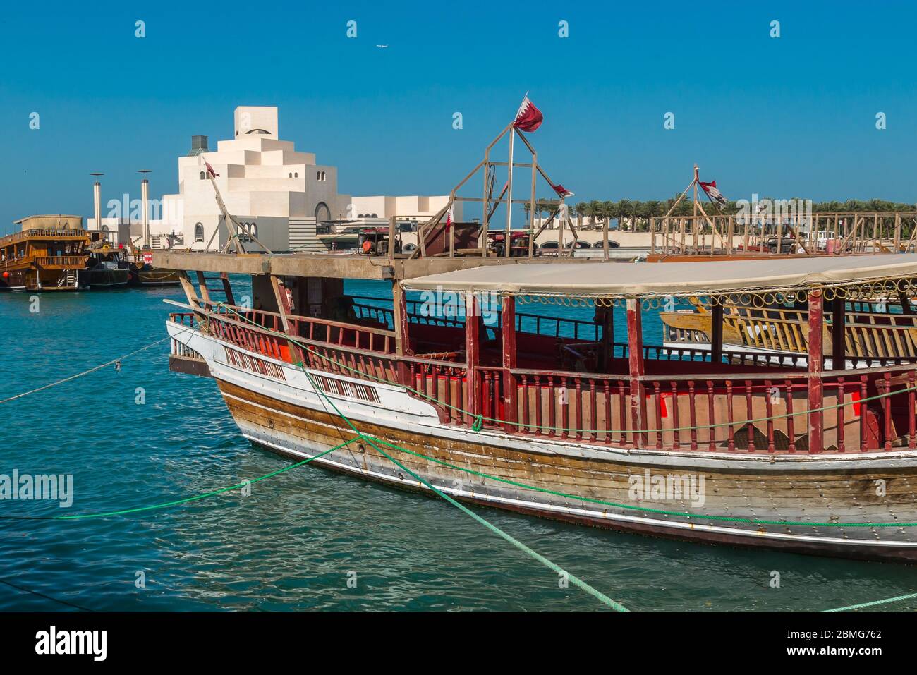 Doha dhau with Museum of Islamic Art Stock Photo - Alamy
