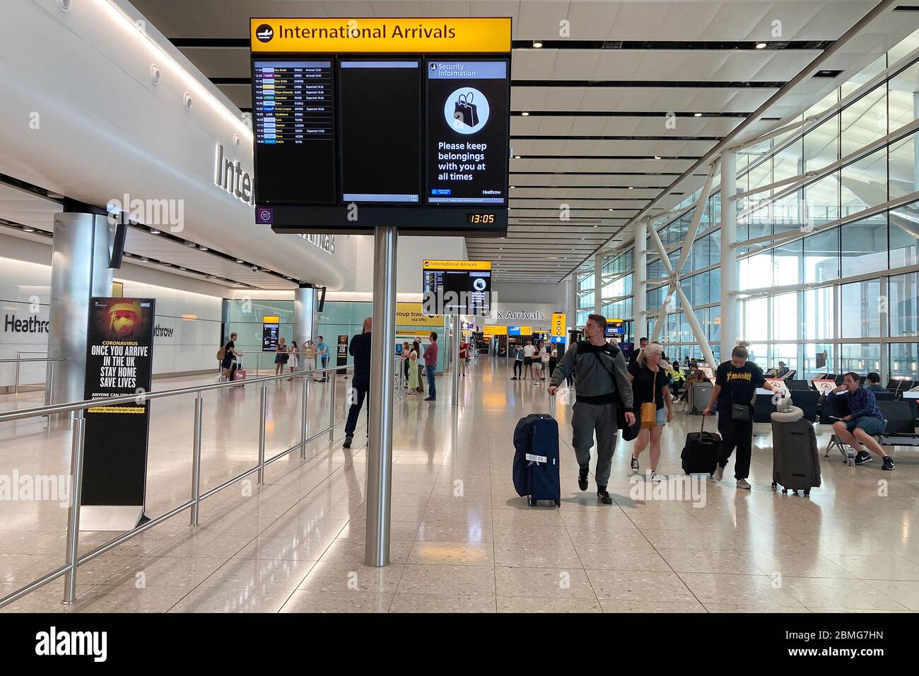 People in Terminal 2 arrivals at London Heathrow, Airport Operators ...