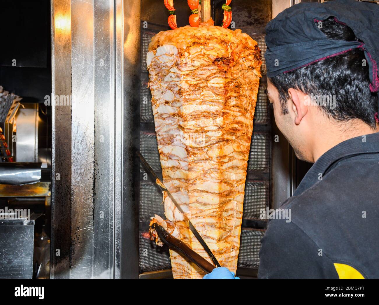 Shawarma, a dish in Middle Eastern cuisine consisting of meat cut into ...