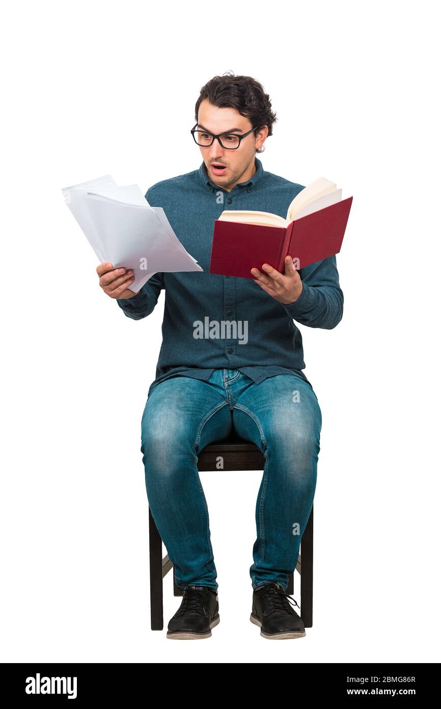 Perplexed man reading document hi-res stock photography and images - Alamy