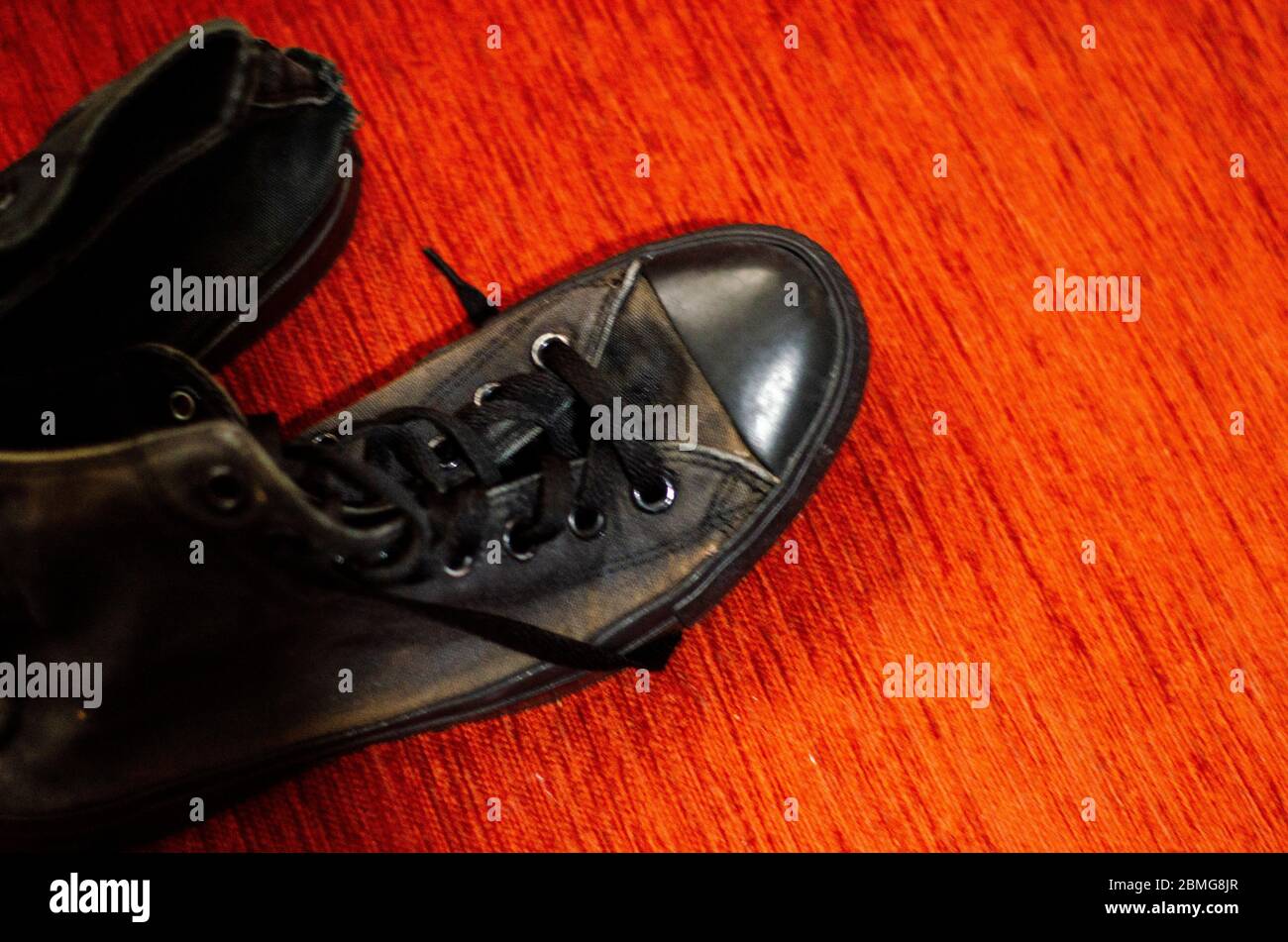 Black boot with red sole hi-res stock photography and images - Alamy