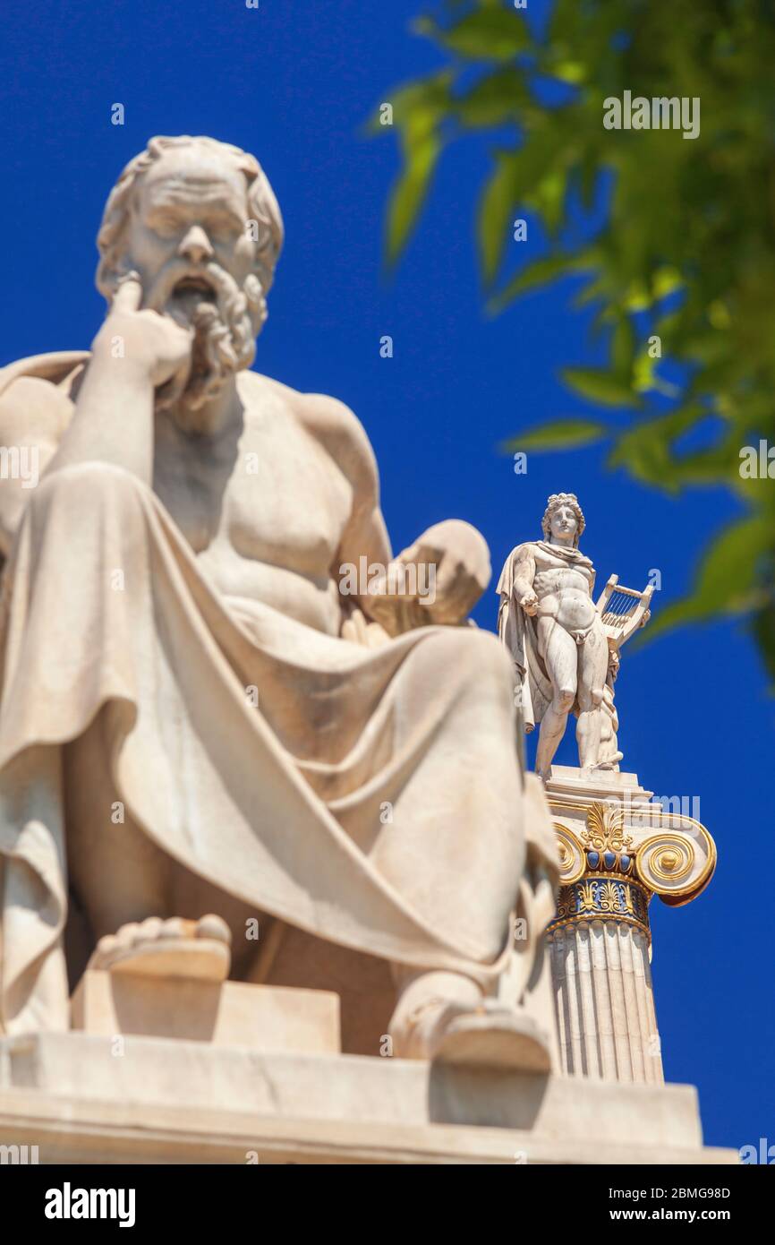 Statue of Socrates in the foreground and ancient god Apollo at the ...