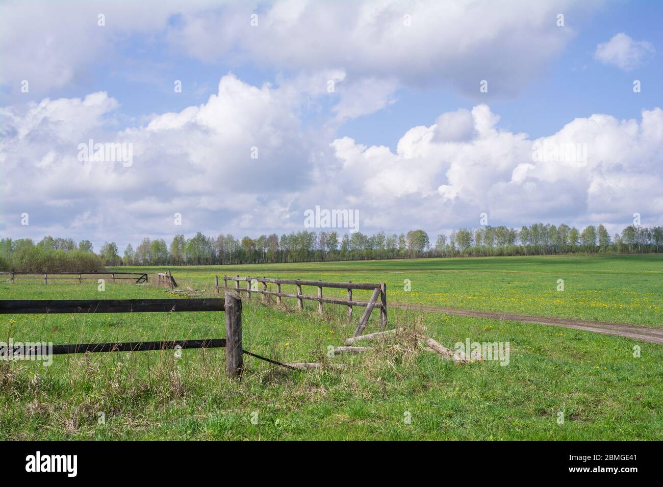 Damaged corral for farm animals among the fields Stock Photo - Alamy