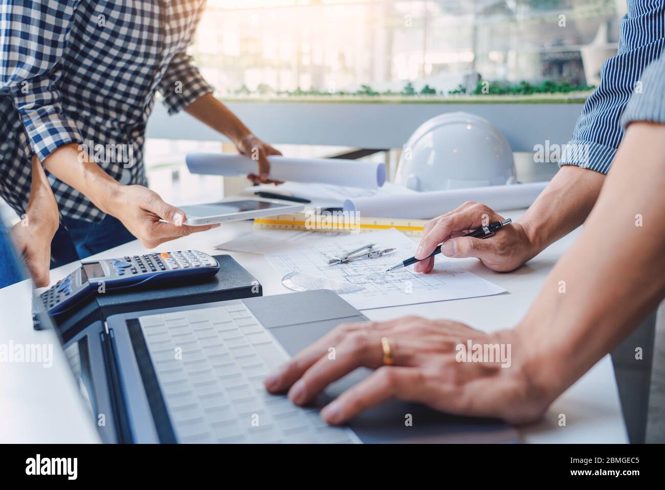 engineer Hand Drawing Plan On Blue Print with architect equipment ...