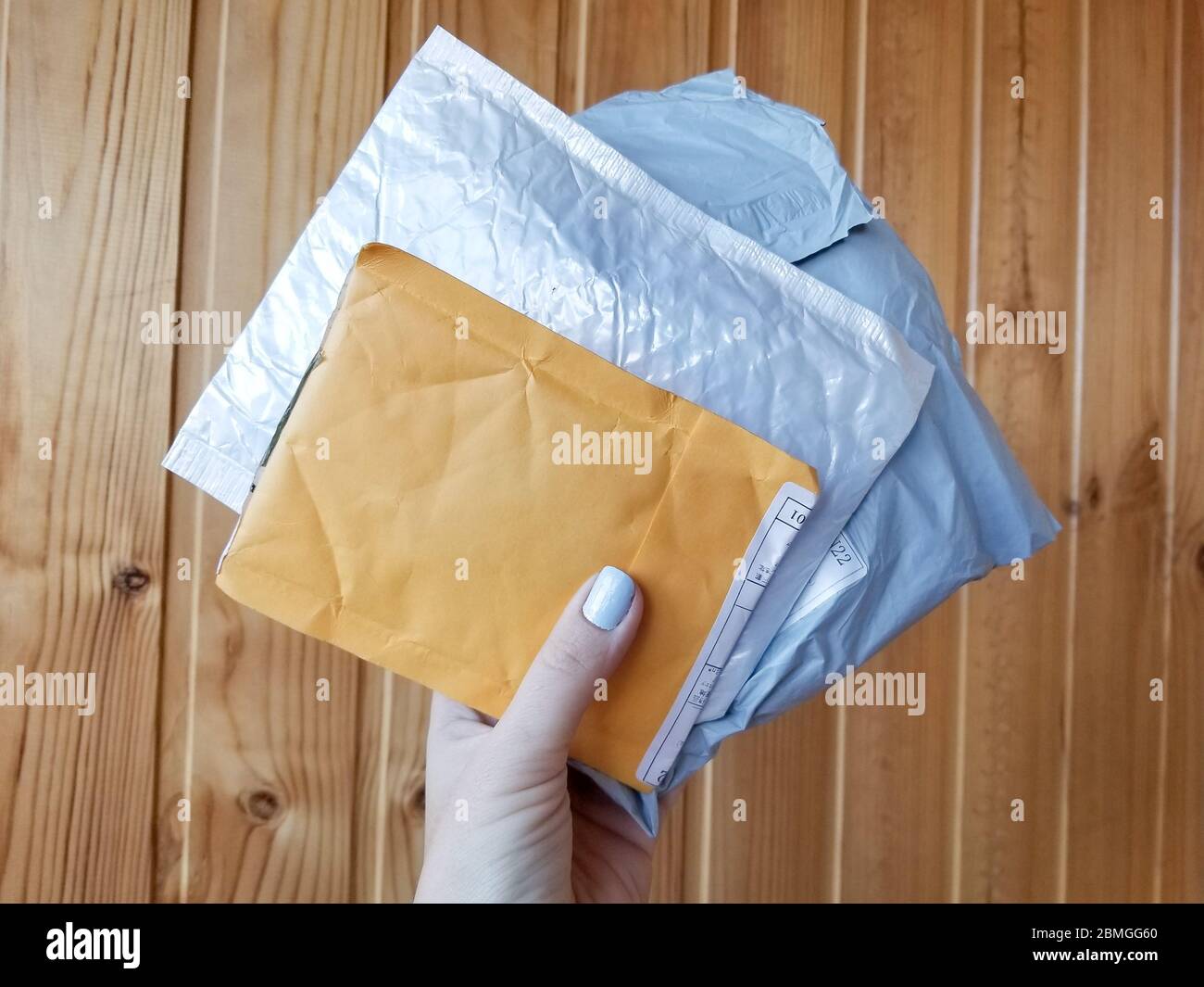Woman parcels lots hi-res stock photography and images - Alamy