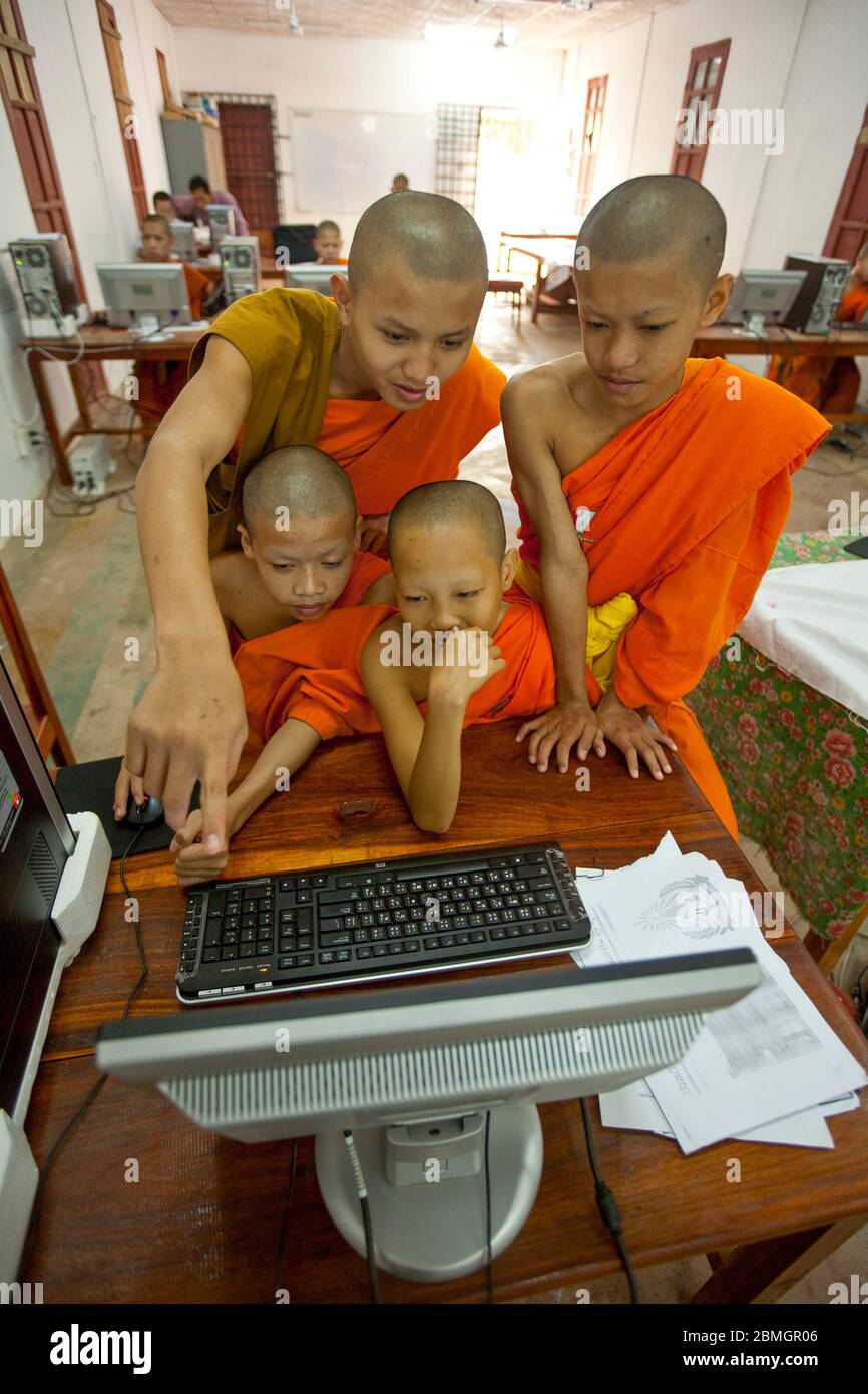 YOUNG BUDDHISTS MONKS USING COMPUTERS IN LUANG PRABANG, LAOS Stock ...