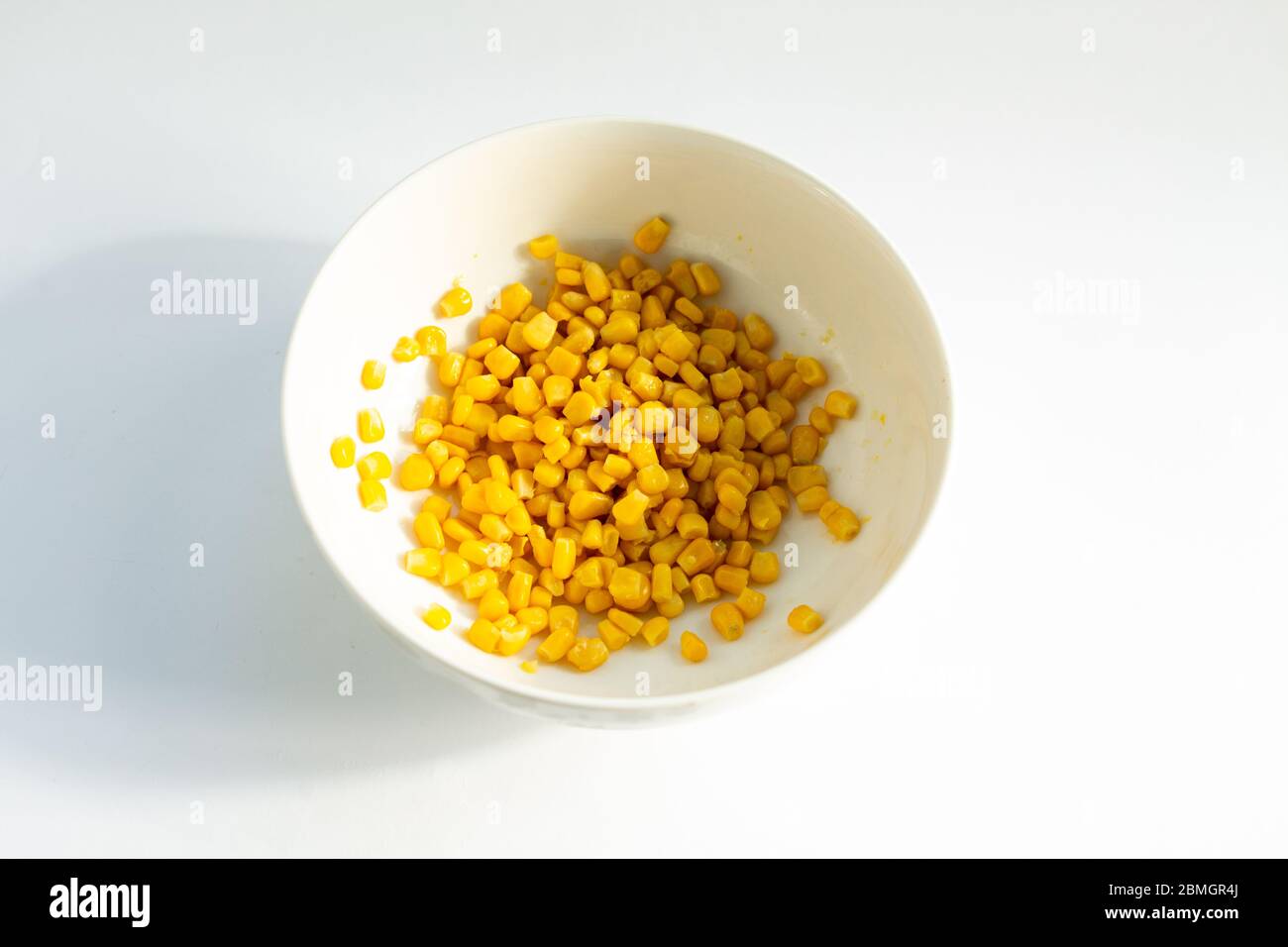 grain of yellow boiled corn closeup lot Stock Photo - Alamy