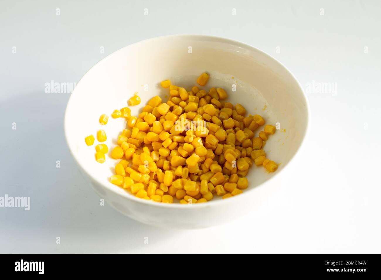 grain of yellow boiled corn closeup lot Stock Photo - Alamy