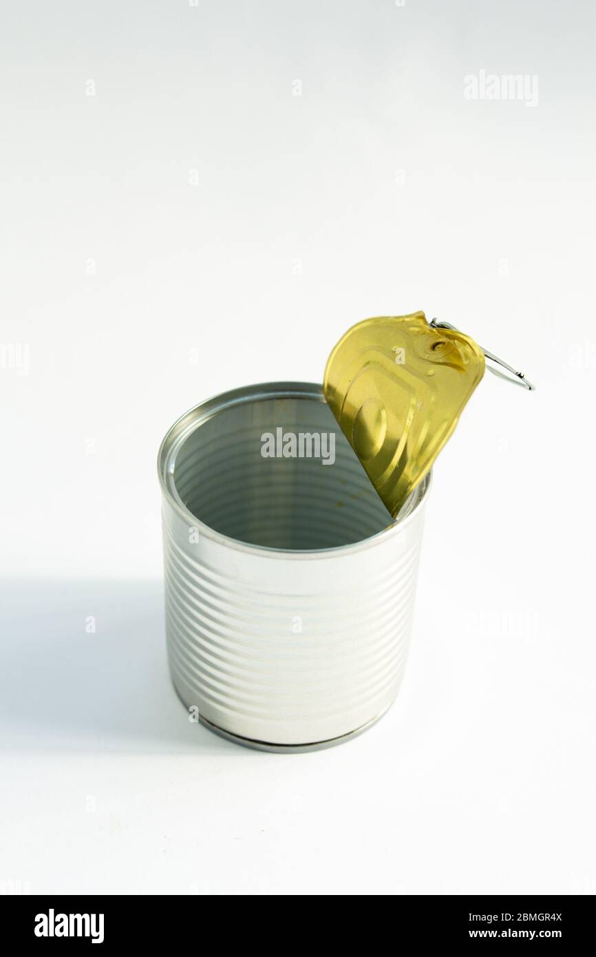 open tin can on a white background Stock Photo - Alamy