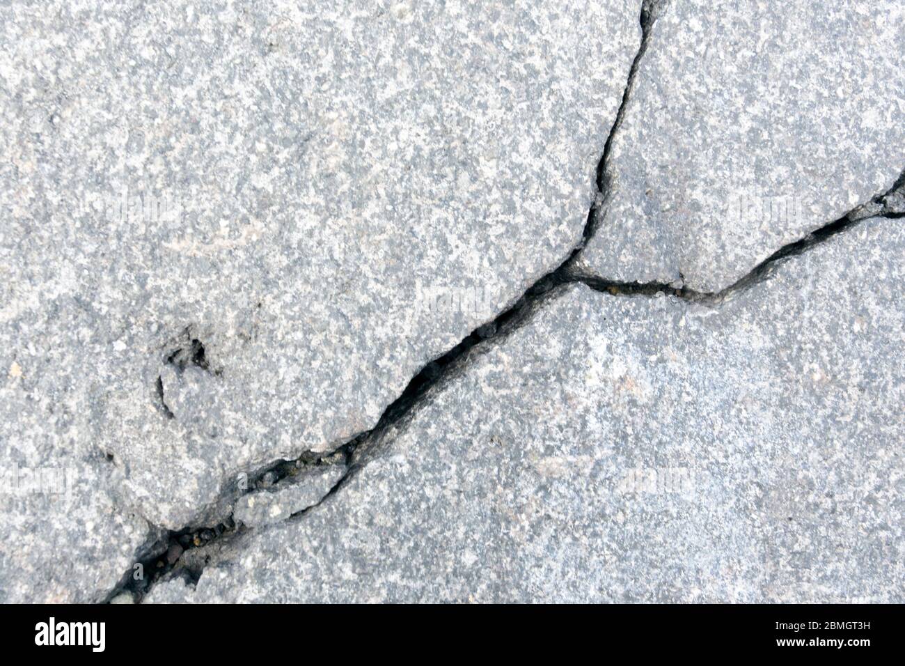 A fractured stone background picture taken in Indonesia Stock Photo - Alamy
