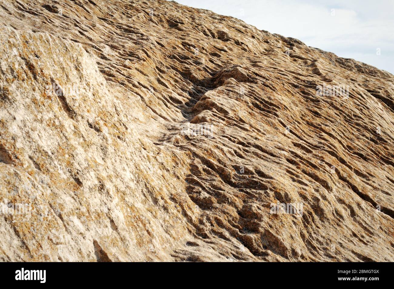 Surface sandy rock. Rocky shore of the Caspian Sea Stock Photo - Alamy