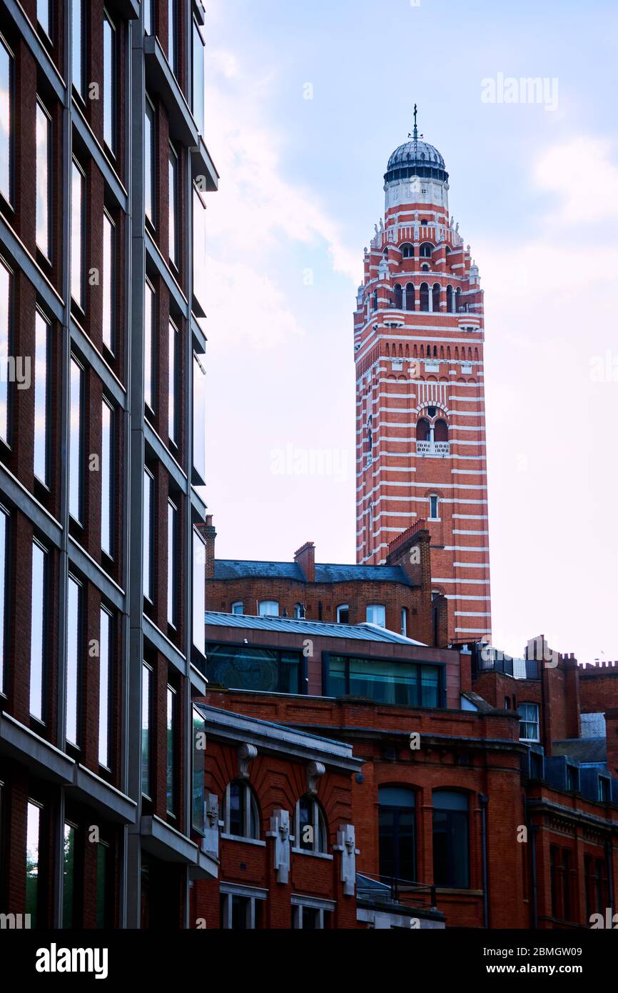 Westminster Cathedral clock tower from street level between modern ...
