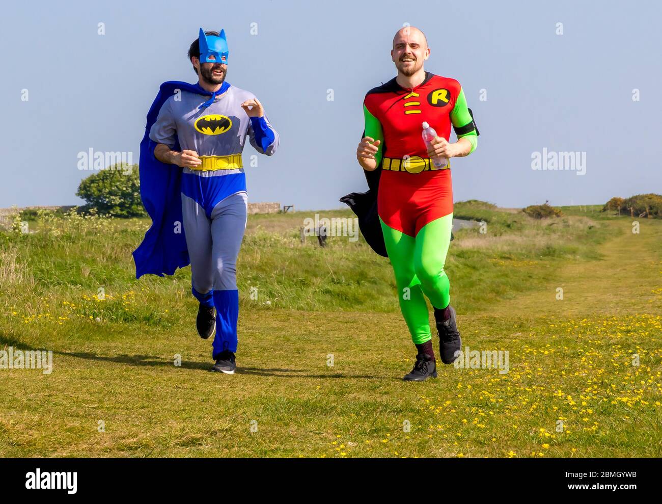 Batman robin running runners hi-res stock photography and images - Alamy