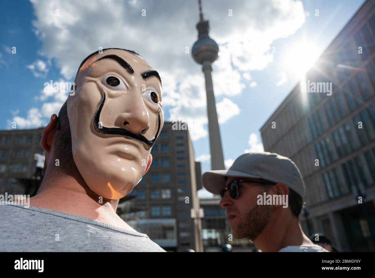 Berlin, Germany. 09th May, 2020. A man wearing an anonymous mask is ...